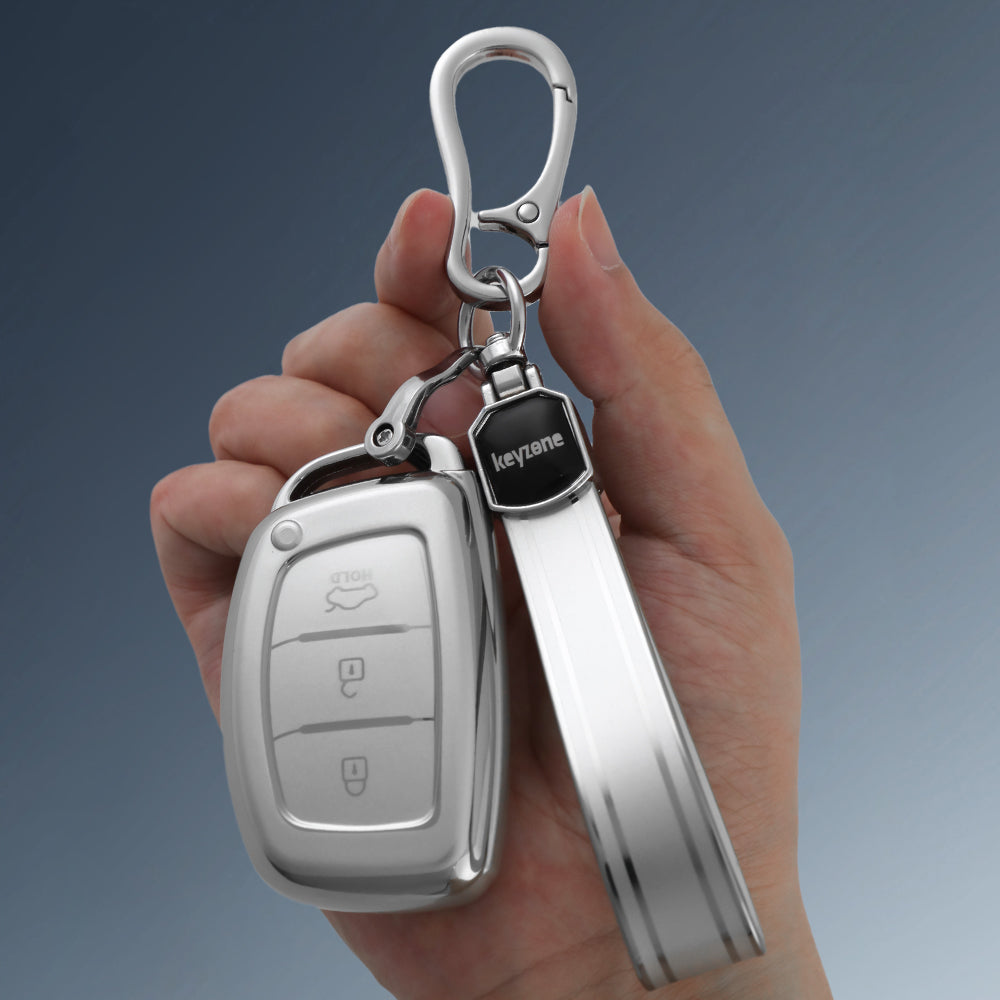 Keyzone silver dust TPU key Cover & keychain for i20 Creta Grand i10 X