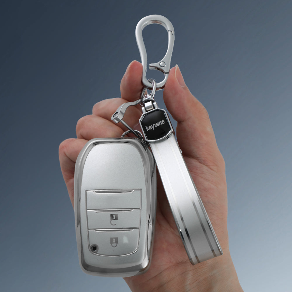 Keyzone silver dust TPU key cover & keychain for Innova Crysta, Innova